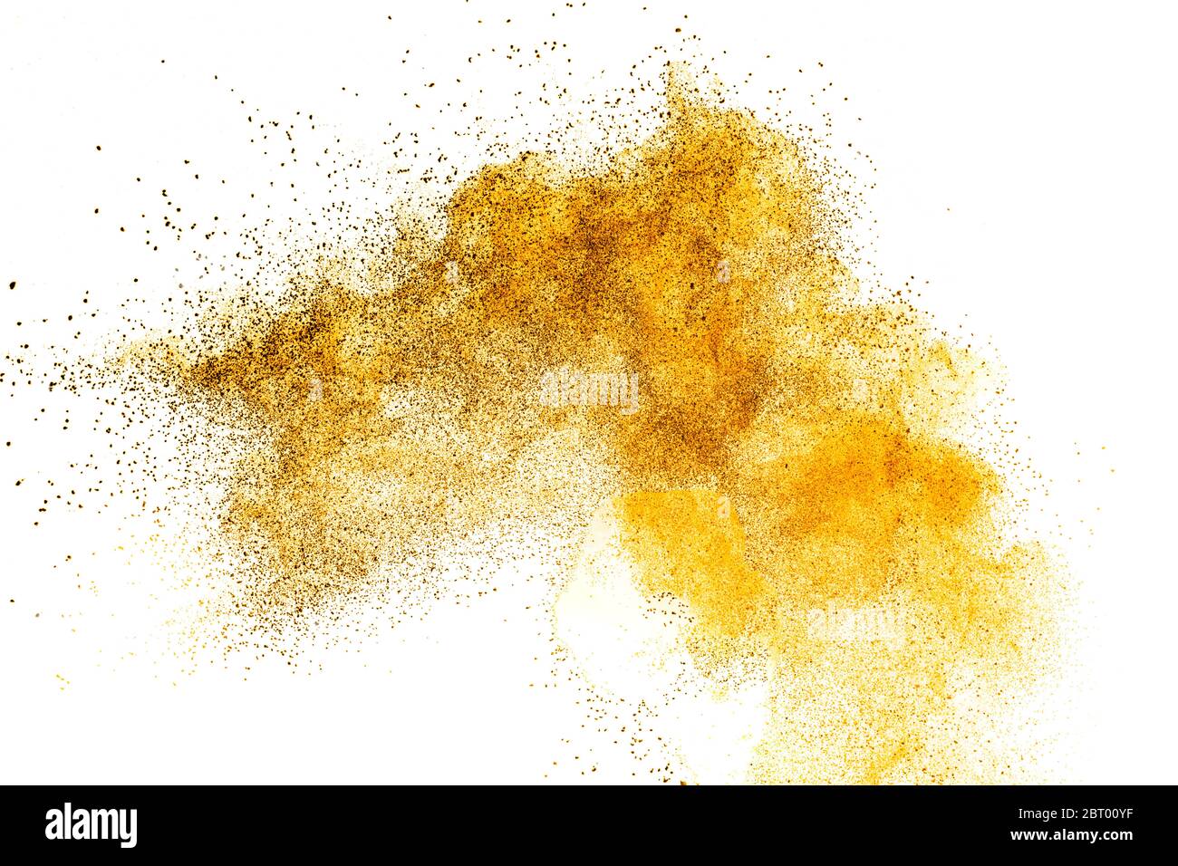 Orange powder splattered on white background.Abstract design of color ...