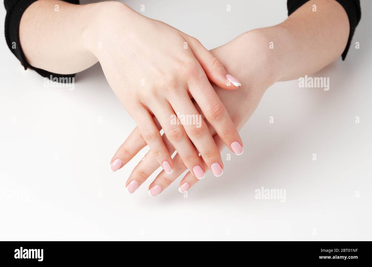 Well-groomed female hands with manicure on white background Stock Photo ...
