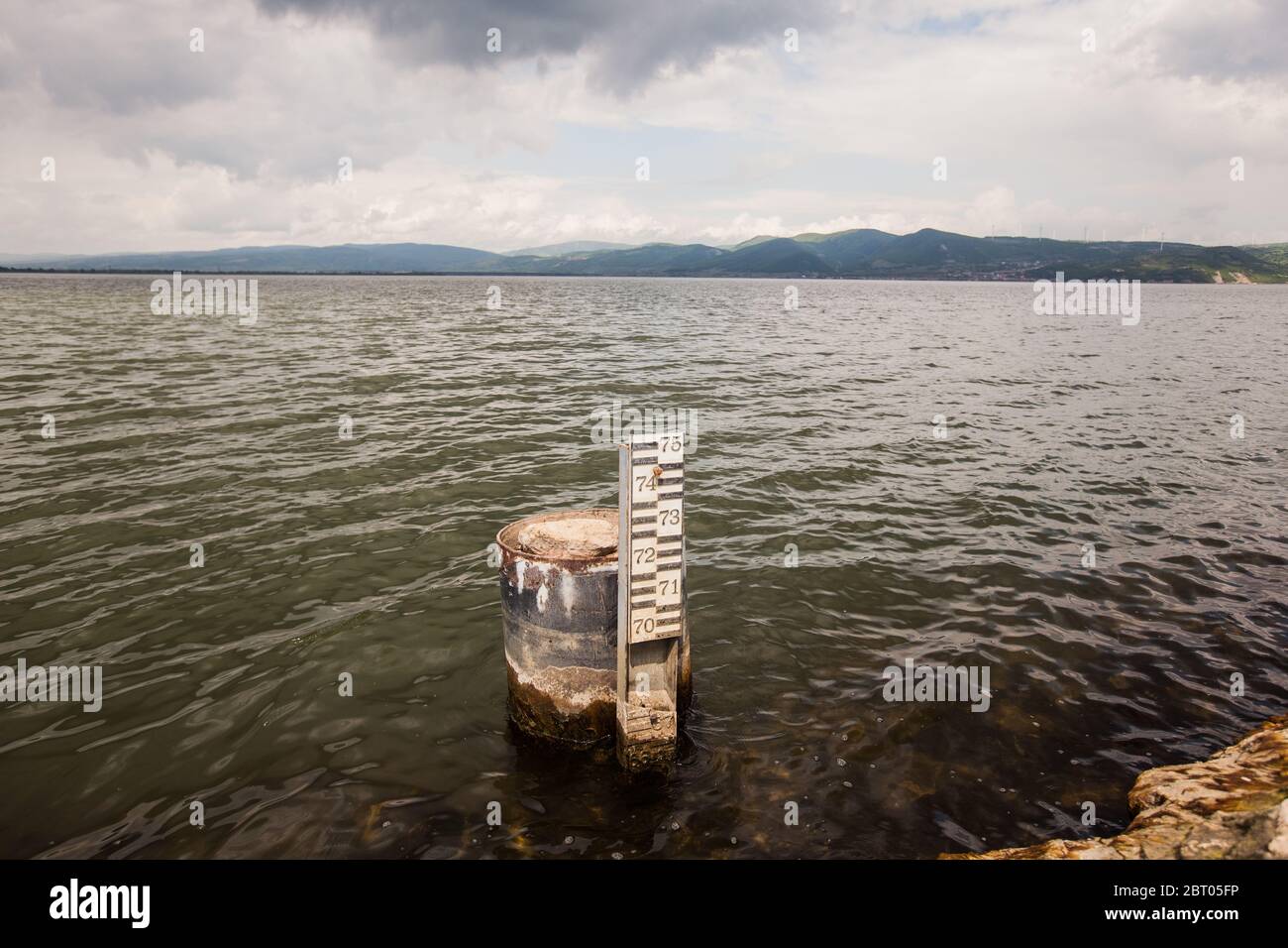 River level marker, Danube river, cloudy summer day Stock Photo - Alamy