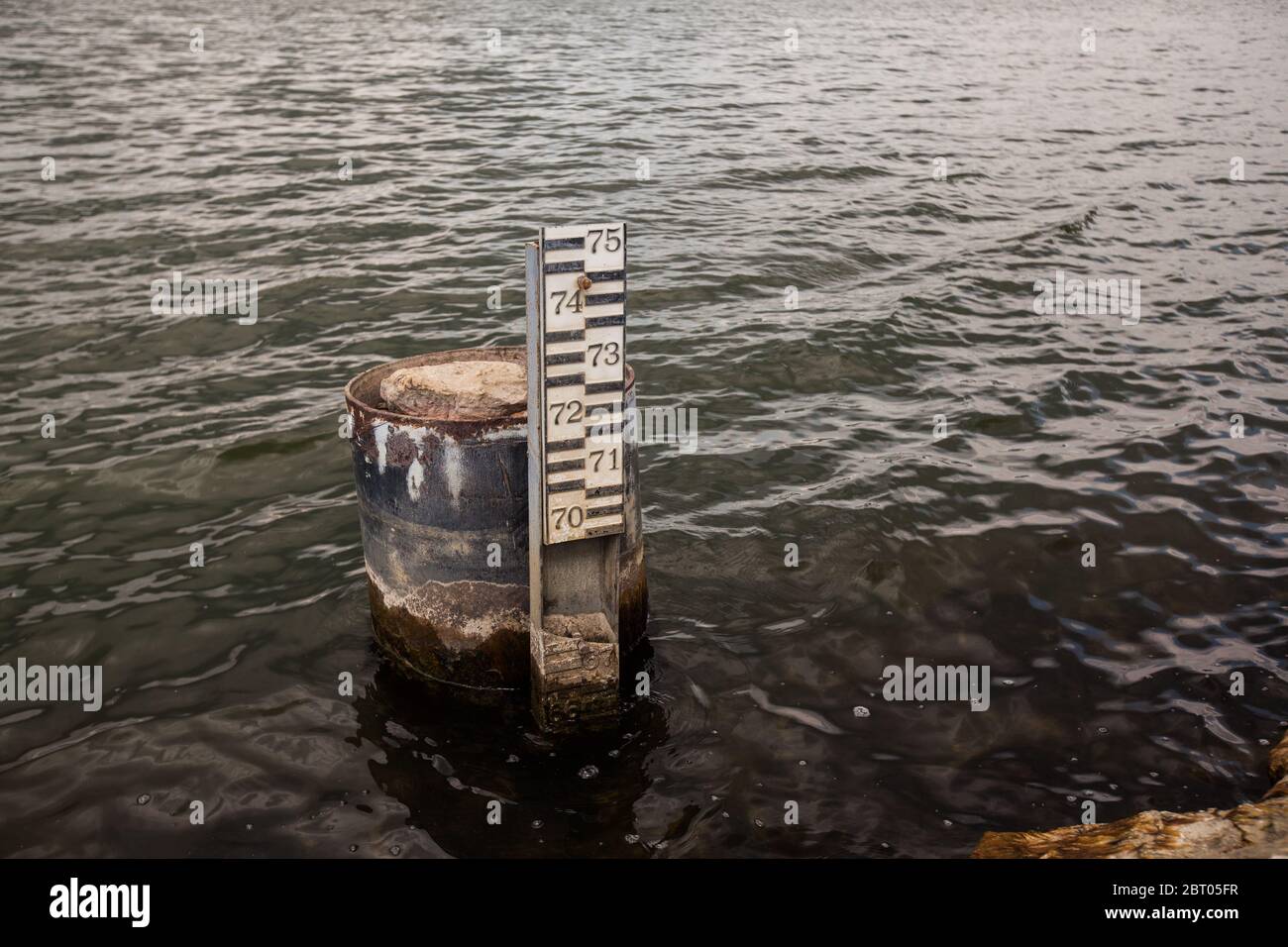 River level marker, Danube river, cloudy summer day Stock Photo - Alamy