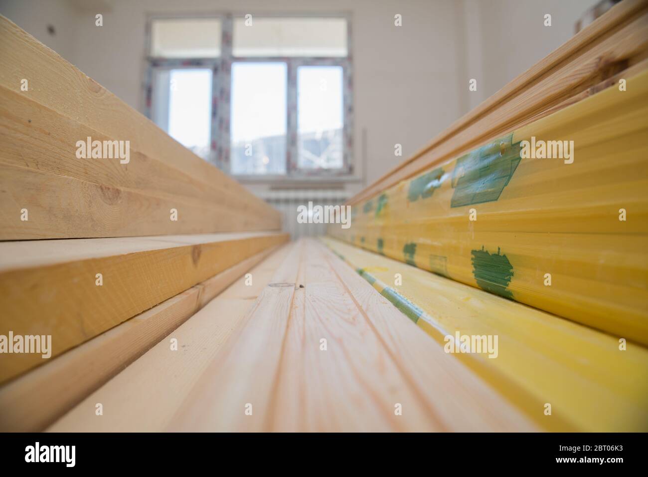 Timber industry objects. Finished wood beams or plank at a warehouse ...