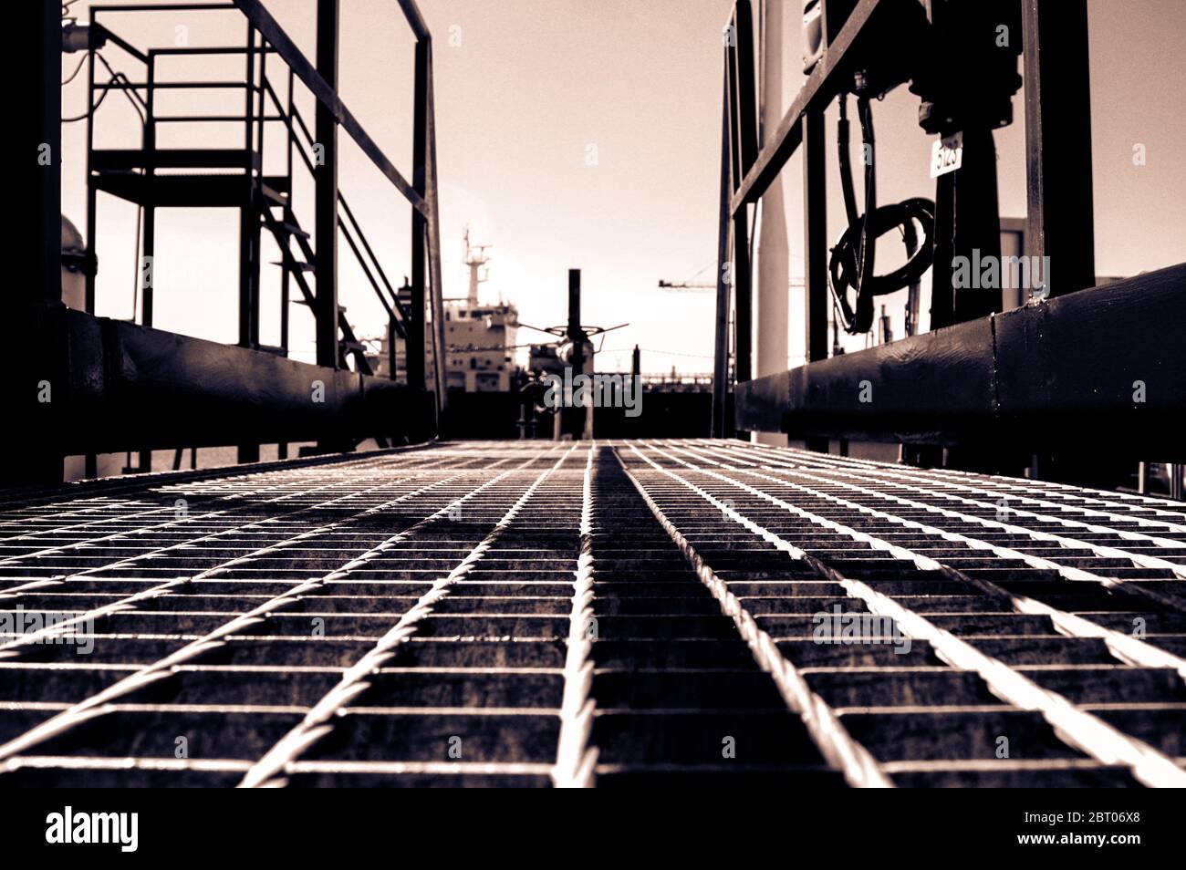 Metal industrial grid on the floor. Metal handrails Stock Photo - Alamy