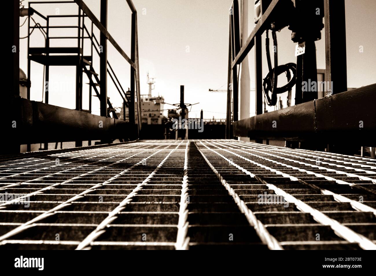 Metal industrial grid on the floor. Metal handrails Stock Photo - Alamy