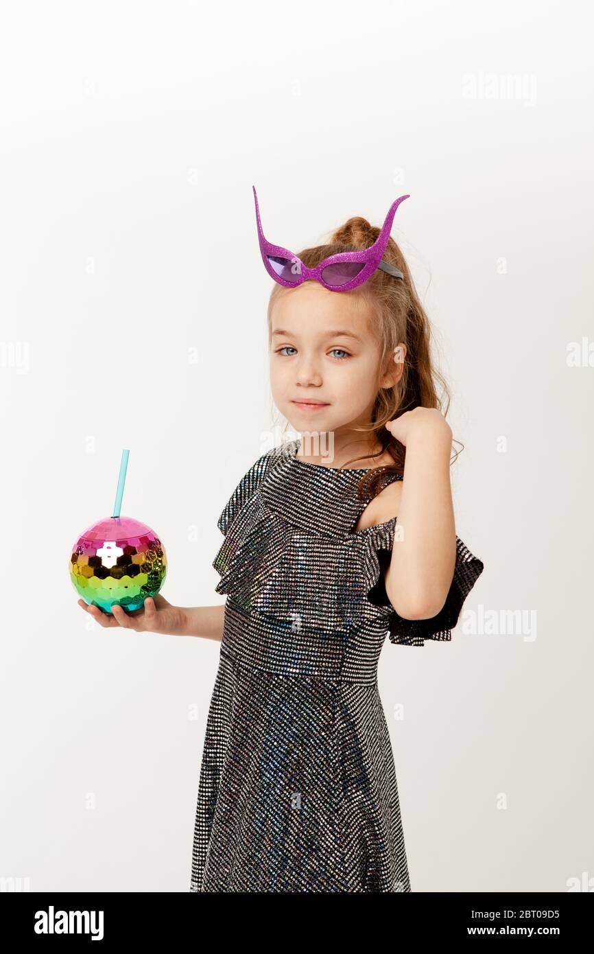 Little girl in sequin dress Stock Photo - Alamy