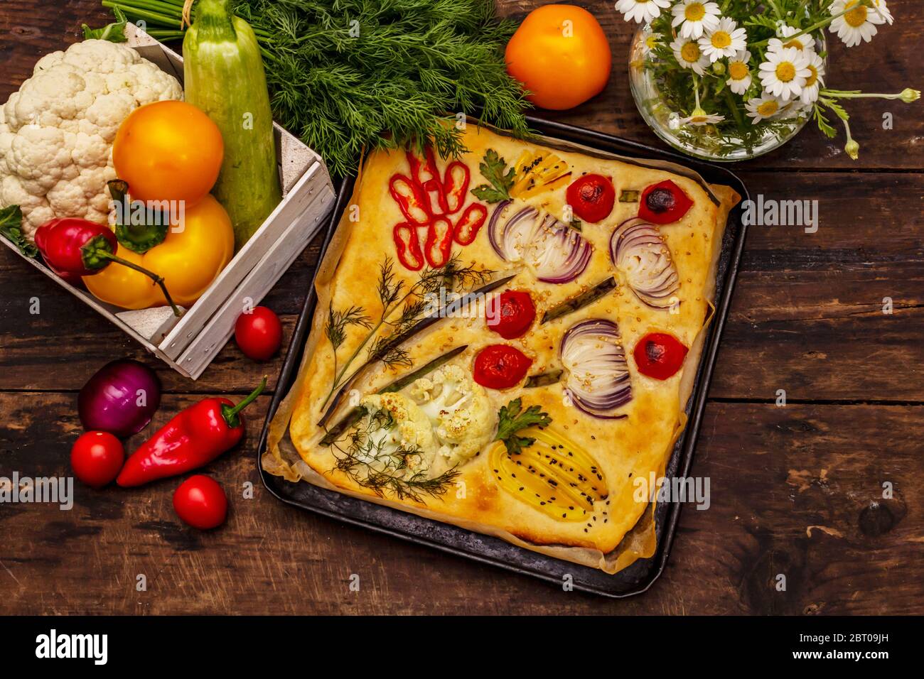 Colorful Garden Focaccia. Fresh ripe vegetables, olive oil, greens ...
