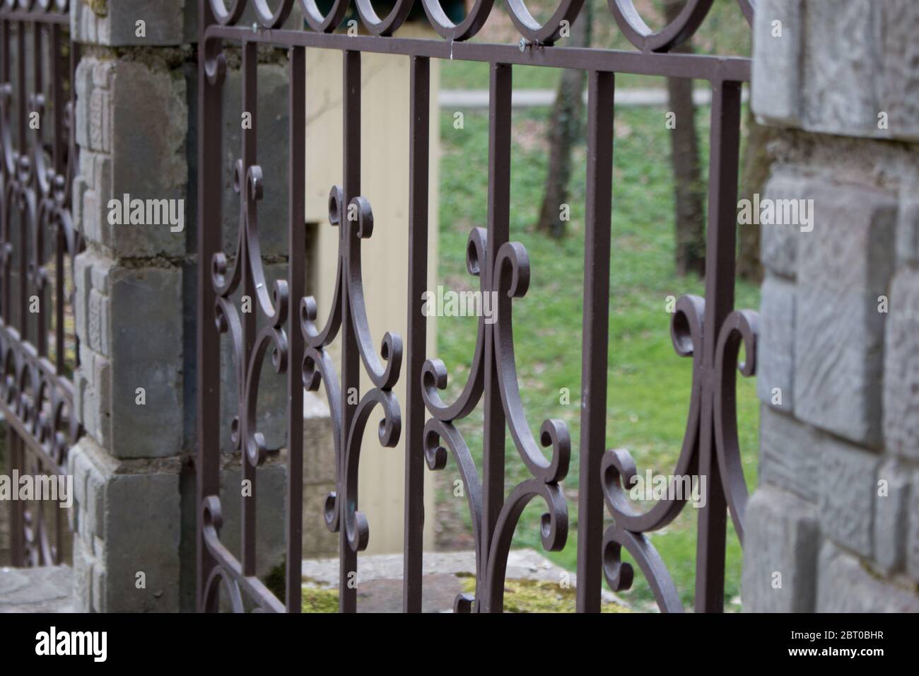 Wrought iron lattice in the park Stock Photo - Alamy