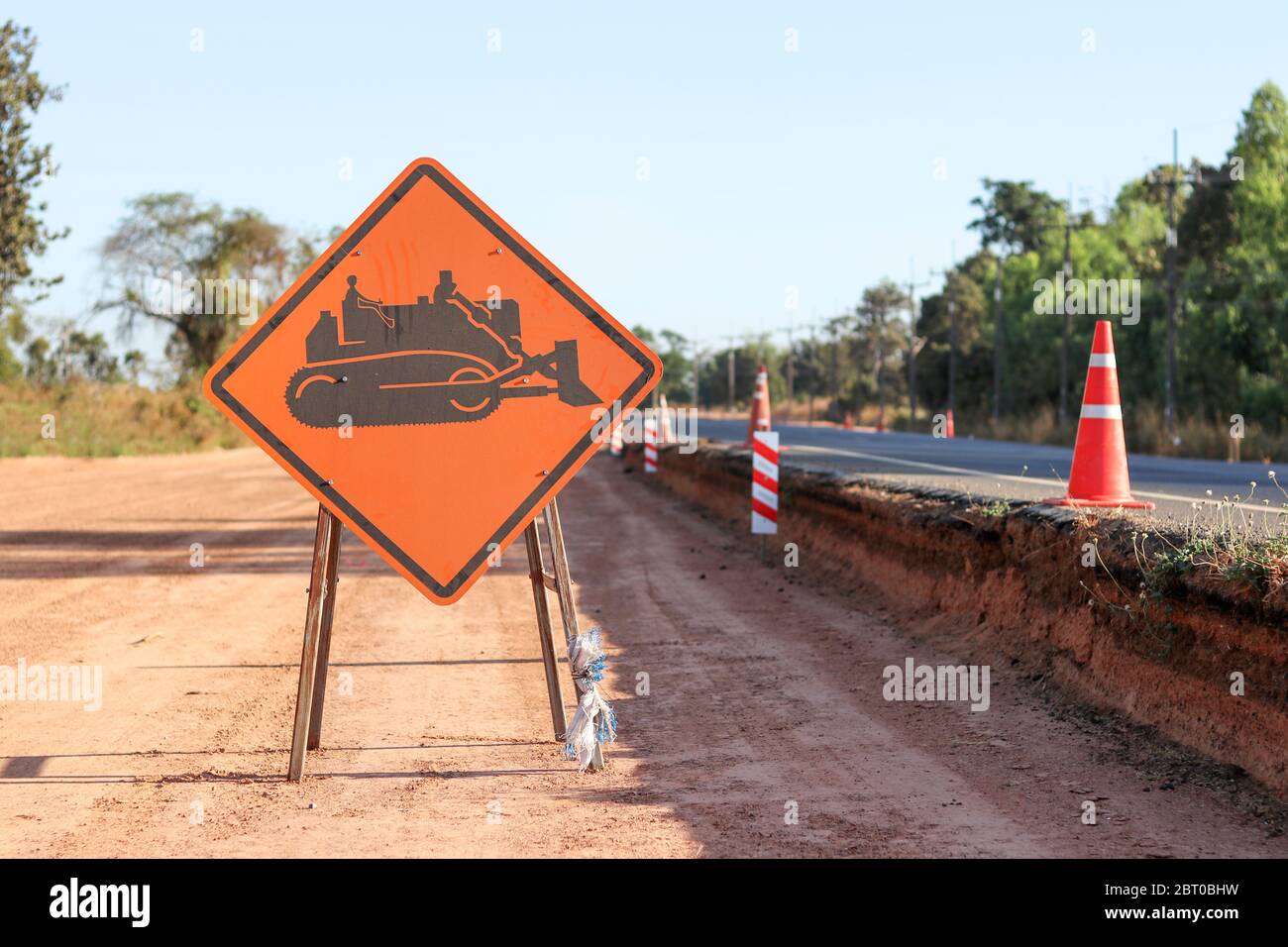 The orange sign shows the machine symbol being operating on the side of ...