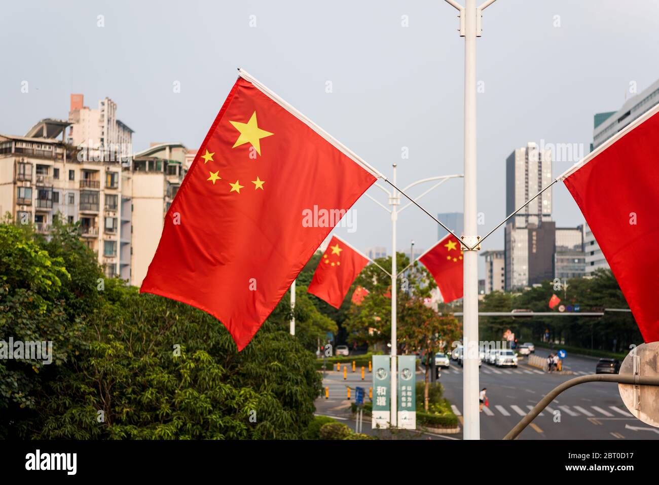 Chinese National flag hanging at the street lamp during holidays in ...