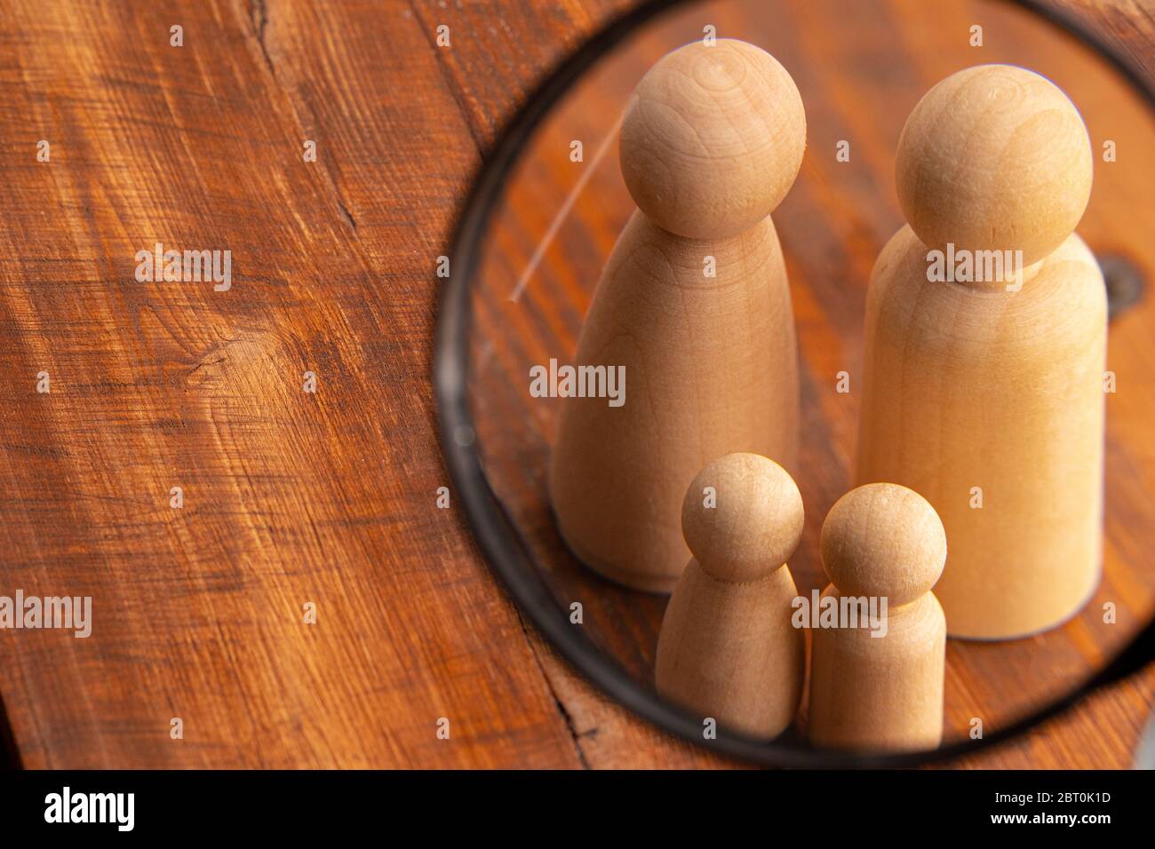 Small wooden figures of family members. Family relationship symbol ...