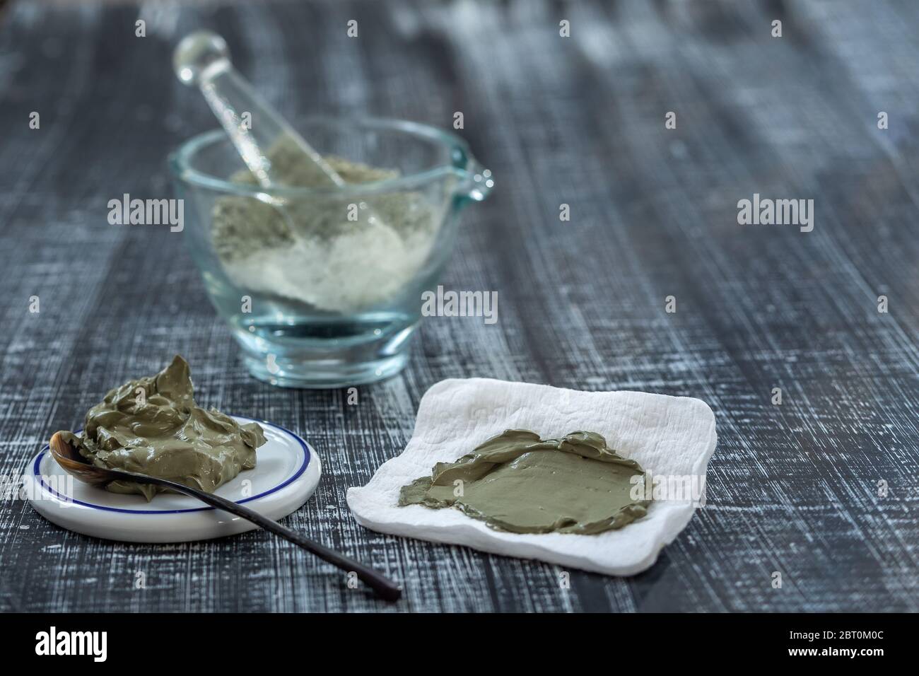 Preparation of green clay for compresses Stock Photo - Alamy