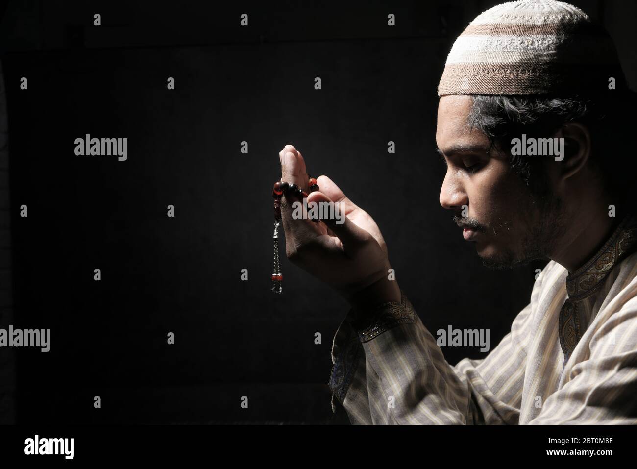 muslim man praying during ramadan at night Stock Photo - Alamy