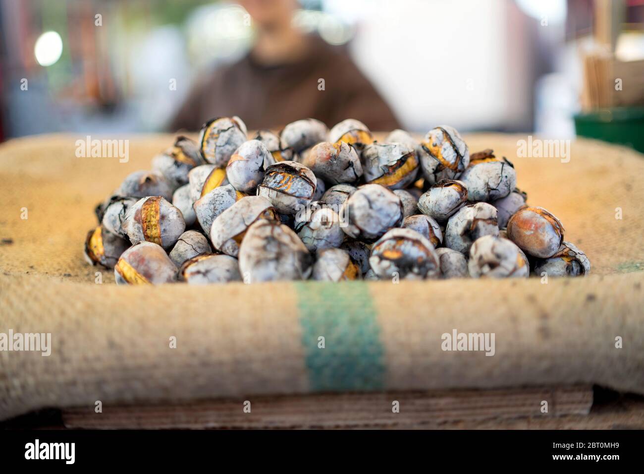 Tasty roasted chestnuts sold on the market stall in Faro, Portugal ...