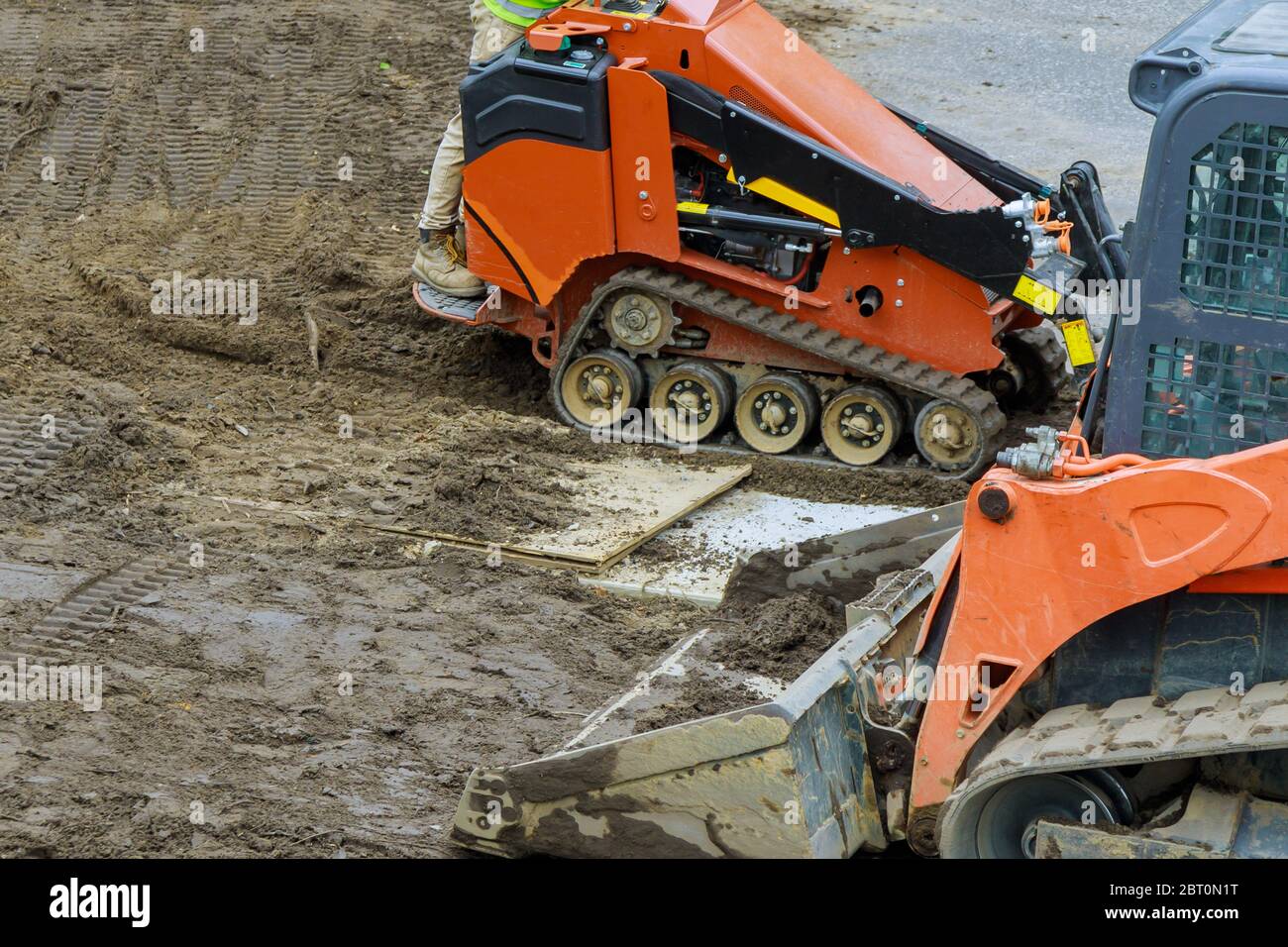 Backhoe digging the ground during works at for soil construction ...