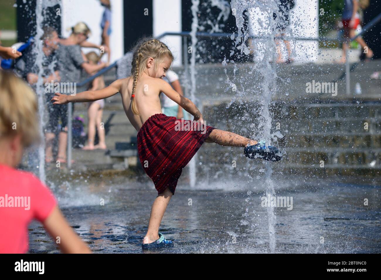 Girl Playing In Water Jets High Resolution Stock Photography and Images ...