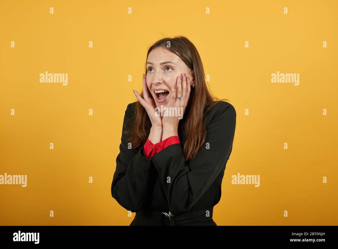 Happy Female Smiling Touches Hands To Bleach. Concept Of People's Joy ...