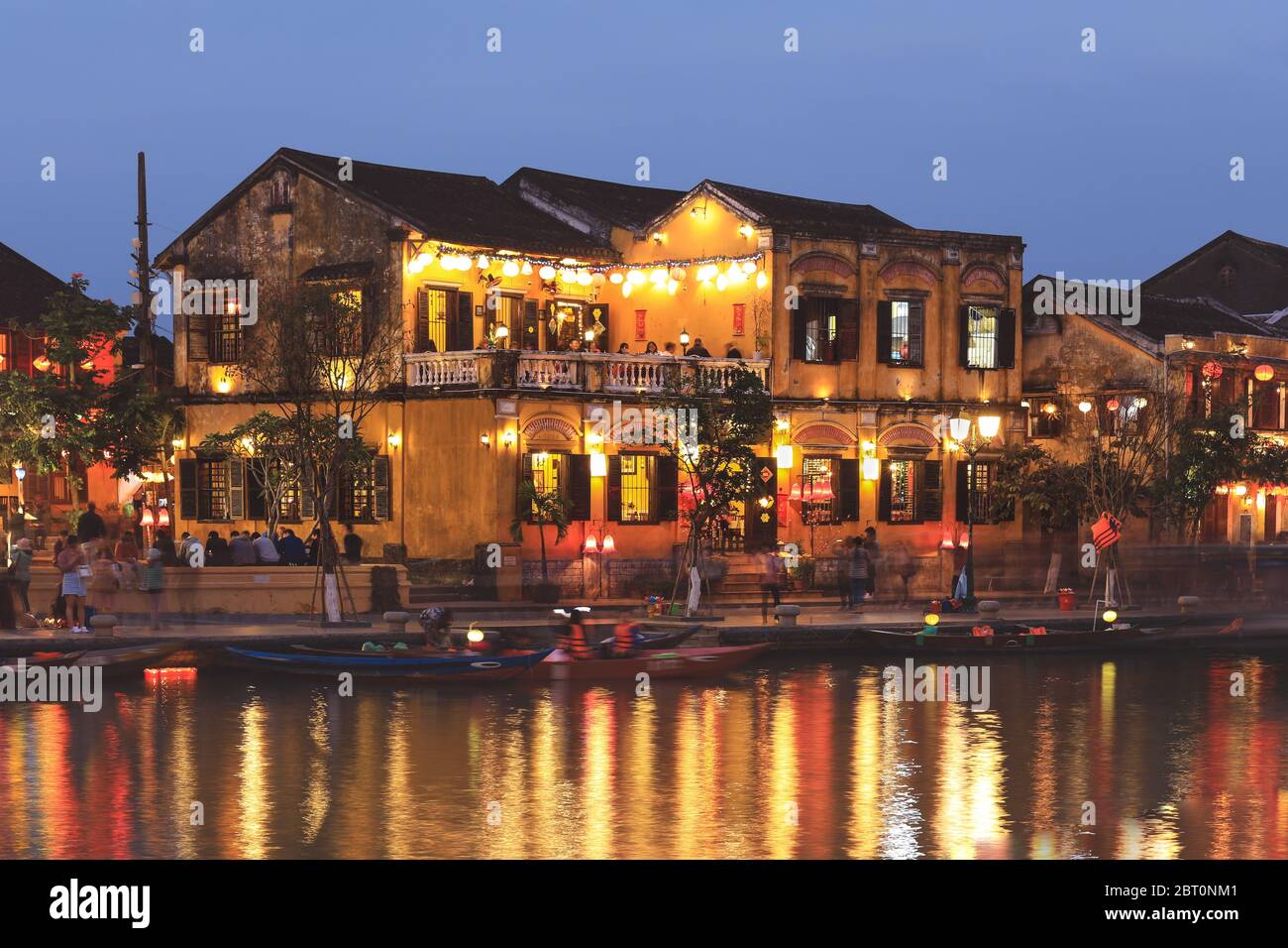 Old houses in Hoi An ancient town at dusk , Hoi An is one of the most ...
