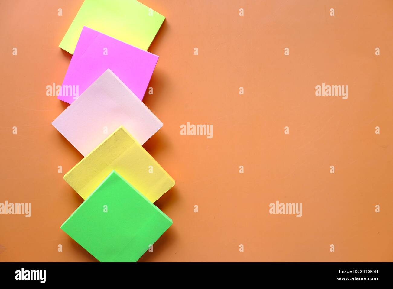 Set of colorful sticky notes on orange background Stock Photo - Alamy
