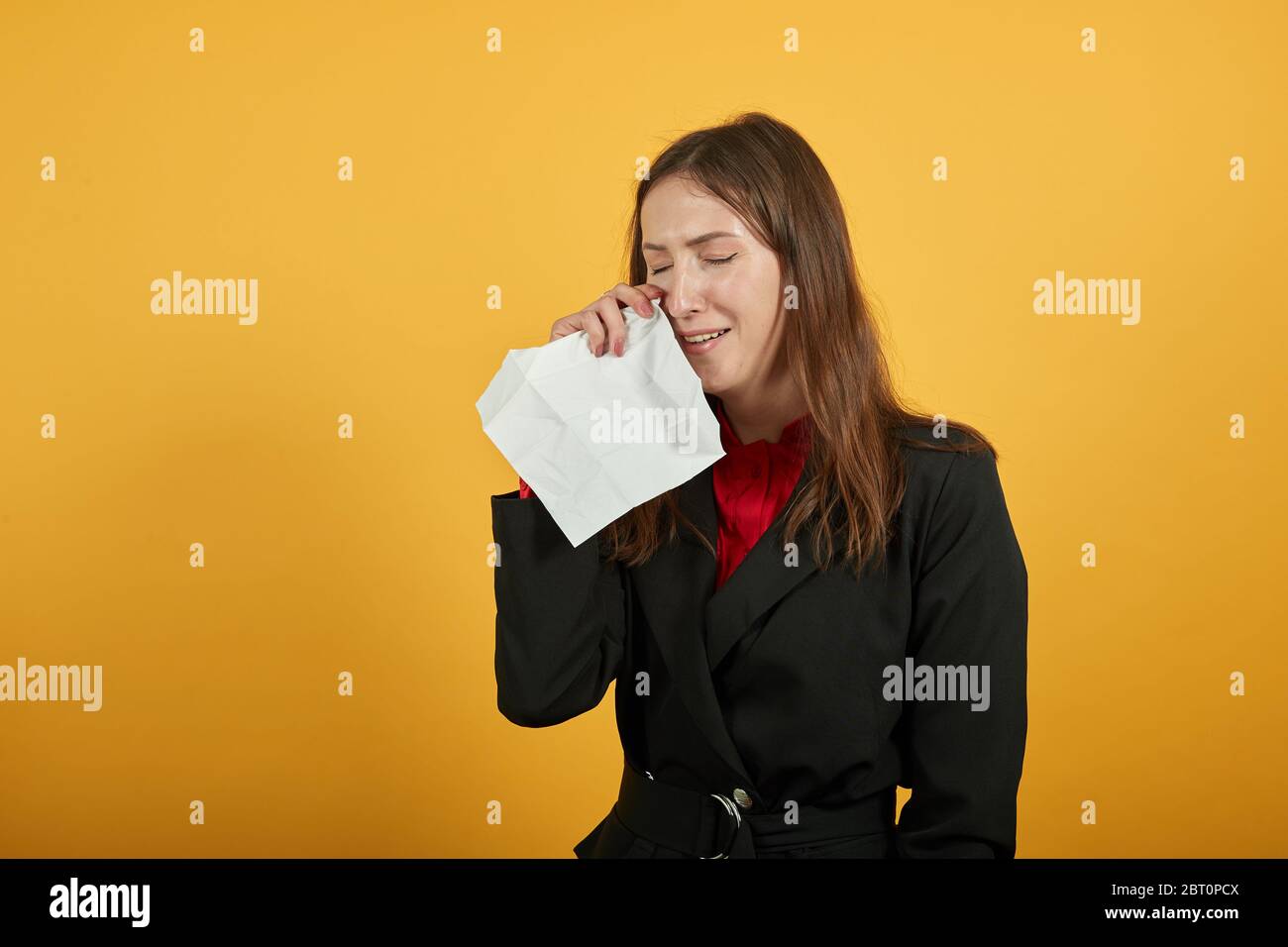 Sad woman holding handkerchief hi-res stock photography and images - Alamy