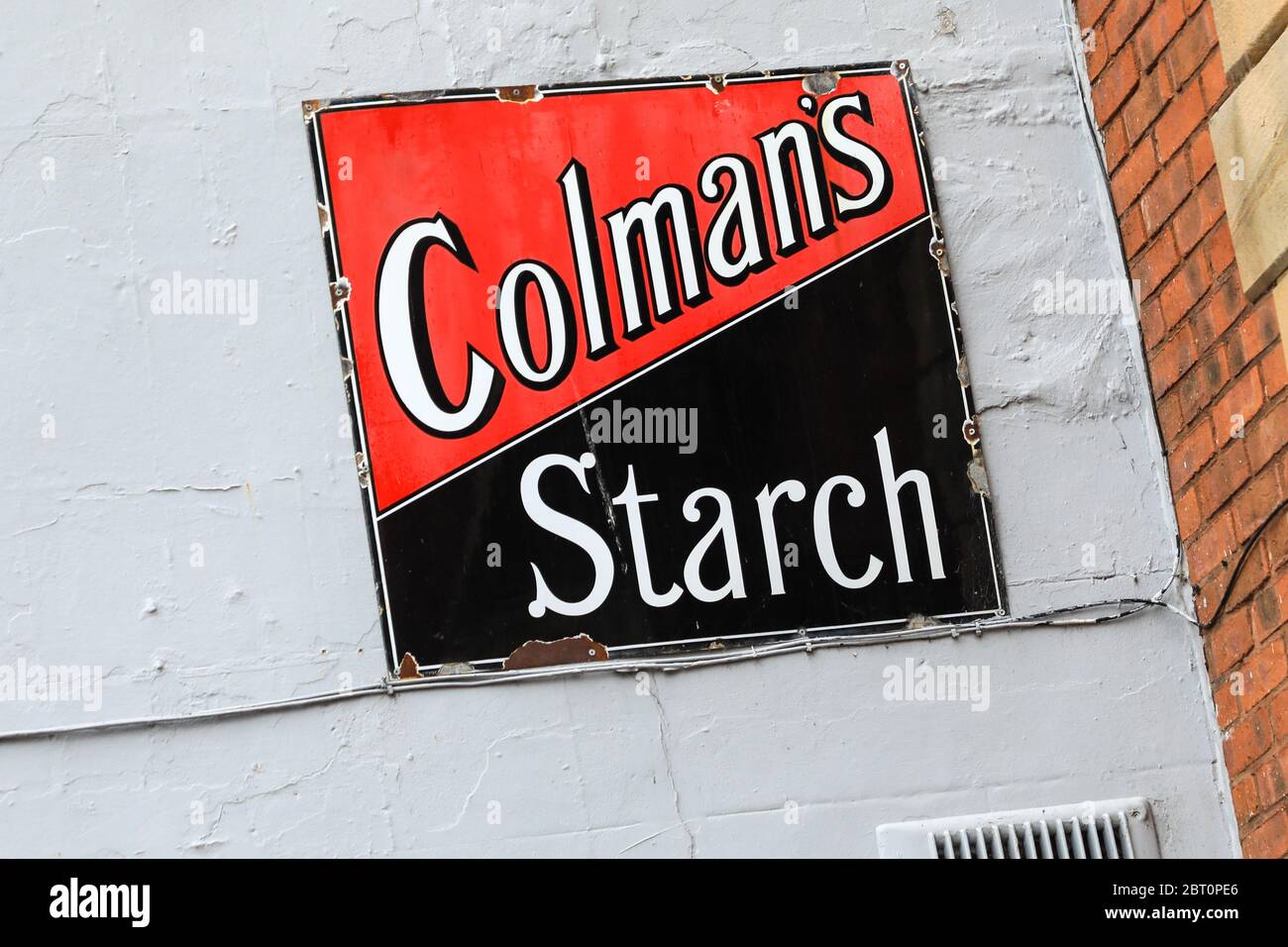 An old Colman's starch enamel advertising sign, England, UK Stock Photo ...