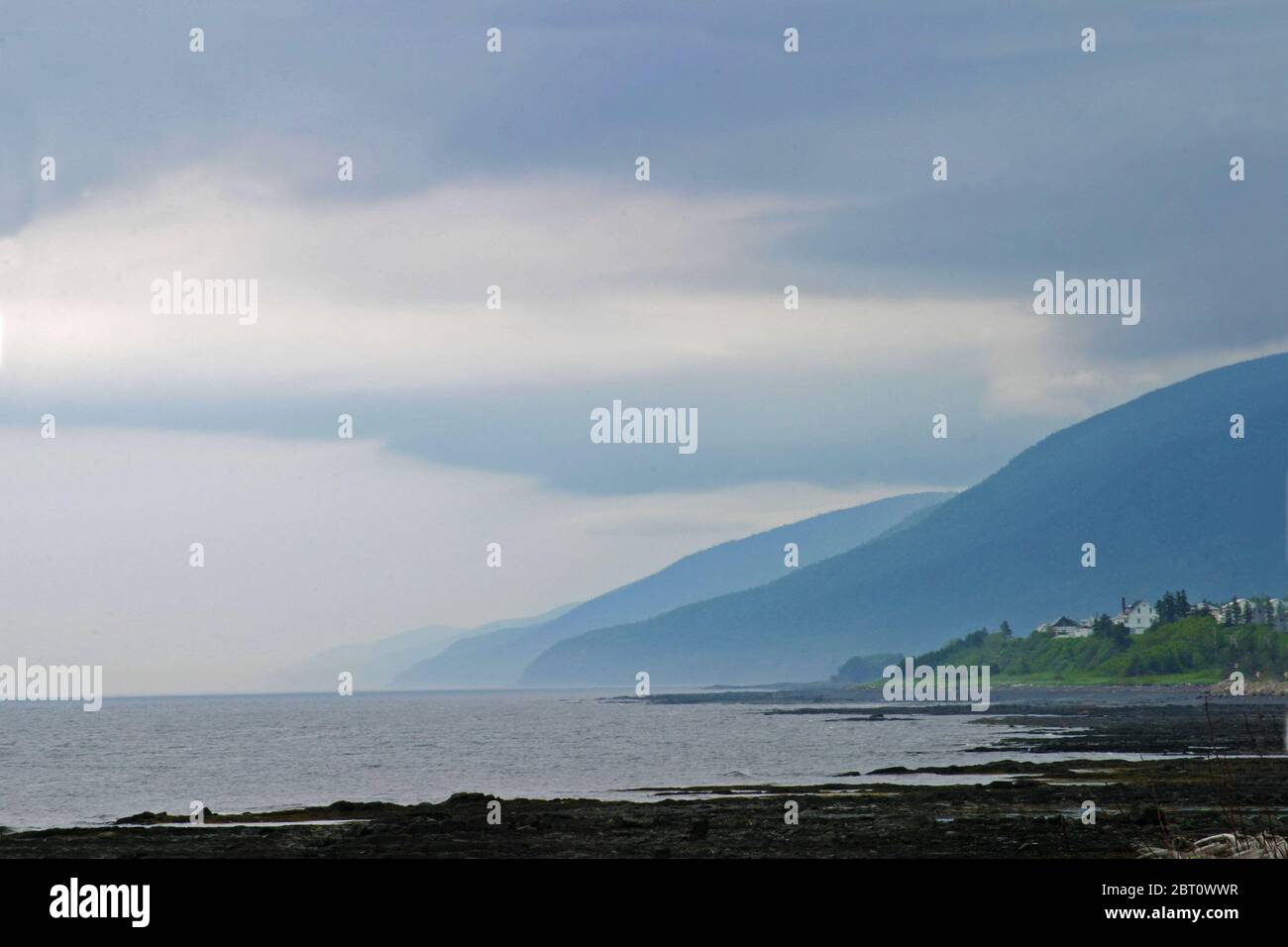 The Coastline by town of Perce, Quebec Stock Photo - Alamy