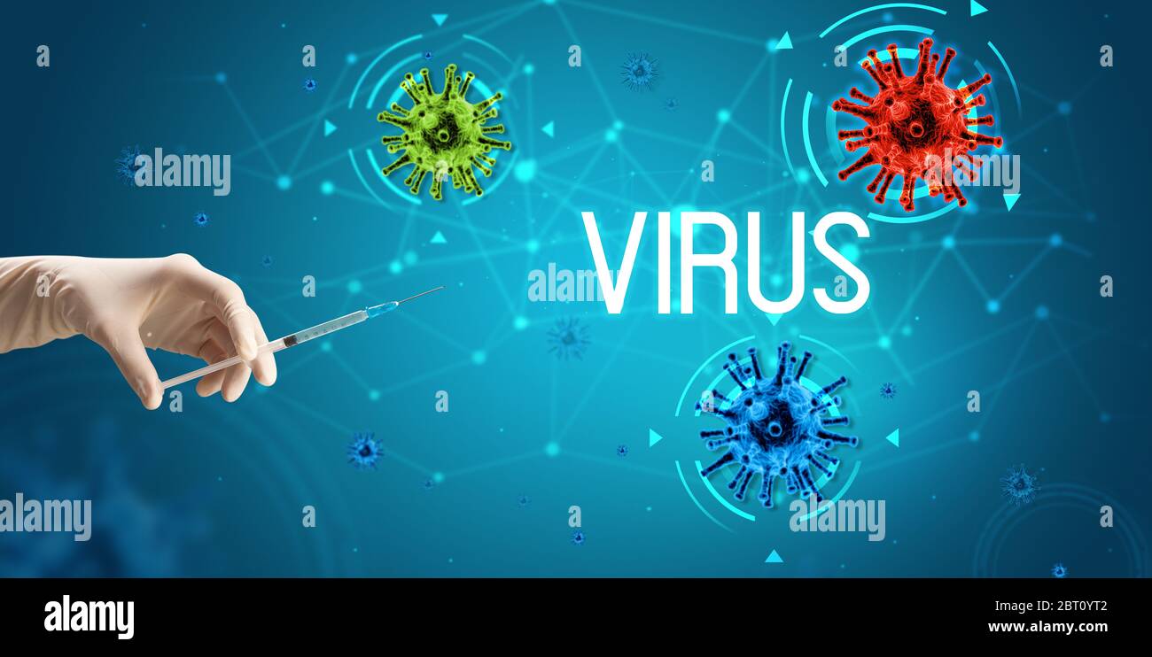 Syringe, medical injection in hand with VIRUS inscription, coronavirus ...