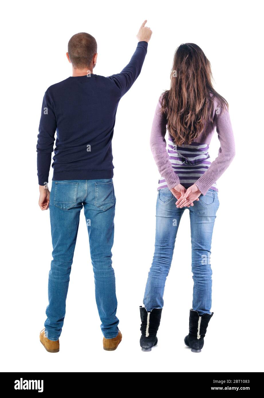 Back view of couple in sweater pointing. Rear view people collection ...