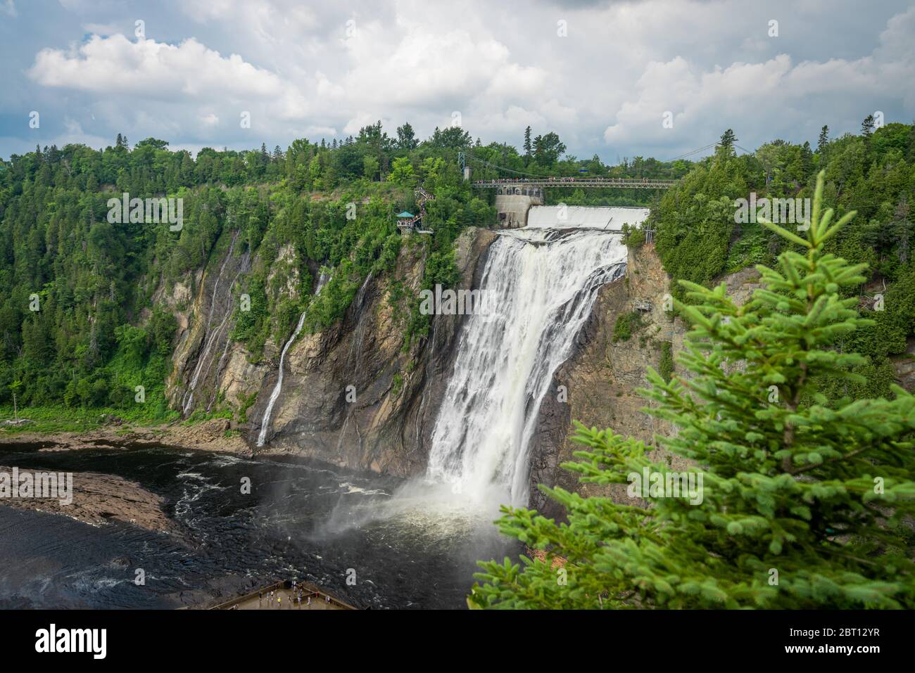 Insane view of Montmorency waterfall with a Christmas tree in the ...