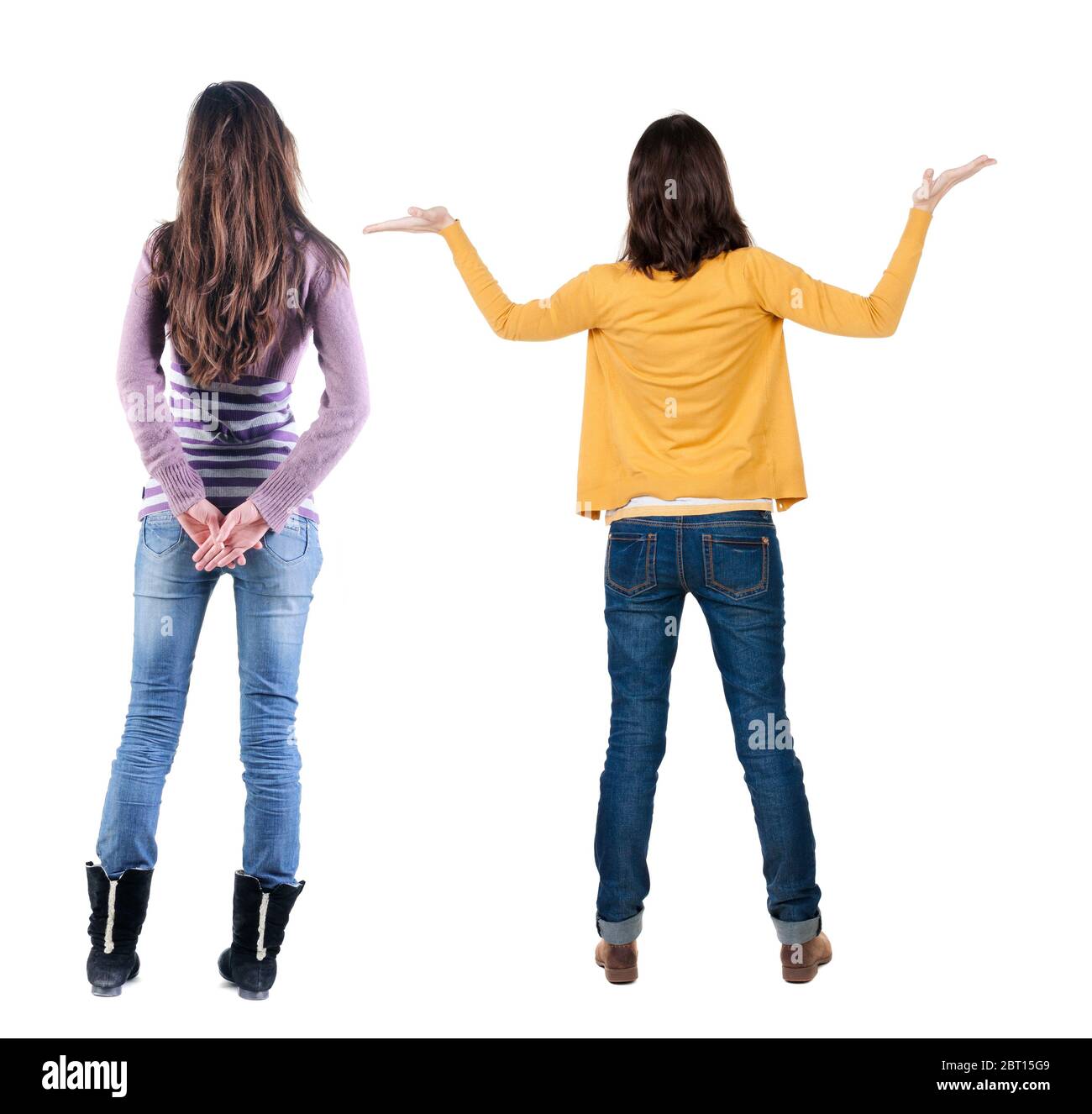 Back view of two woman in sweater. Rear view people collection ...