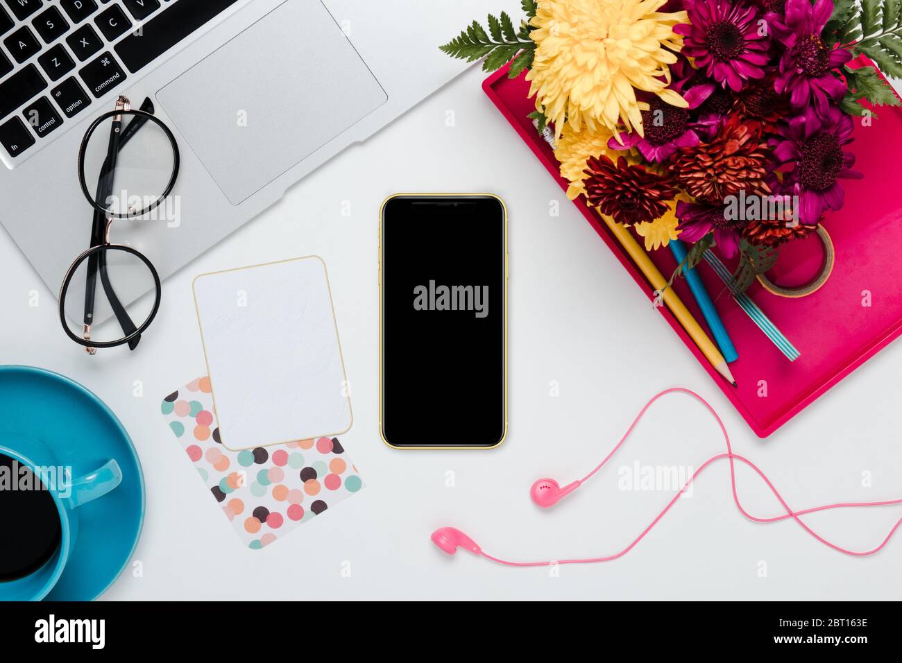 Colorful office cellphone layout with desk accessories Stock Photo - Alamy