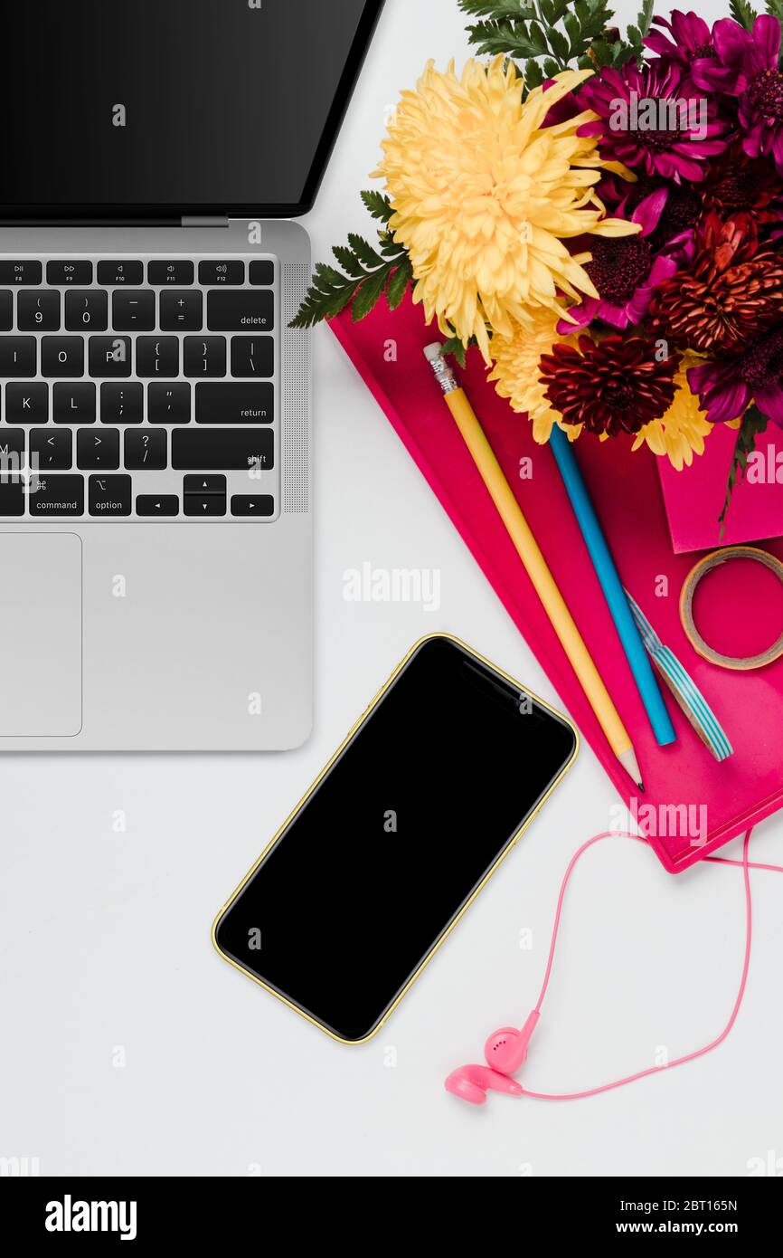 Colorful office cellphone layout with desk accessories Stock Photo - Alamy