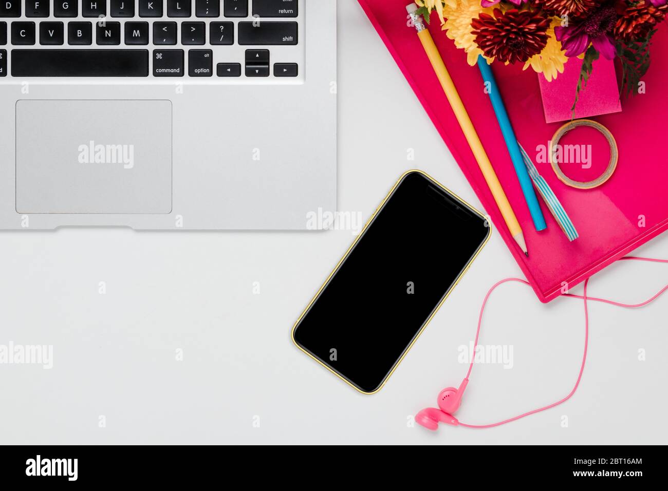 Colorful office cellphone layout with desk accessories Stock Photo - Alamy