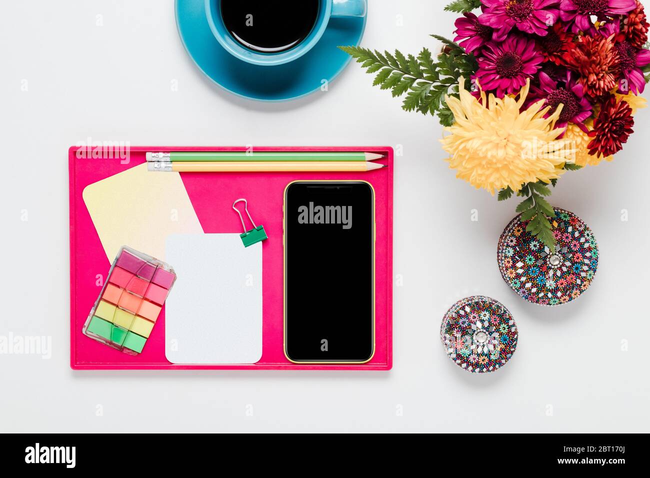 Colorful office cellphone layout with desk accessories Stock Photo - Alamy