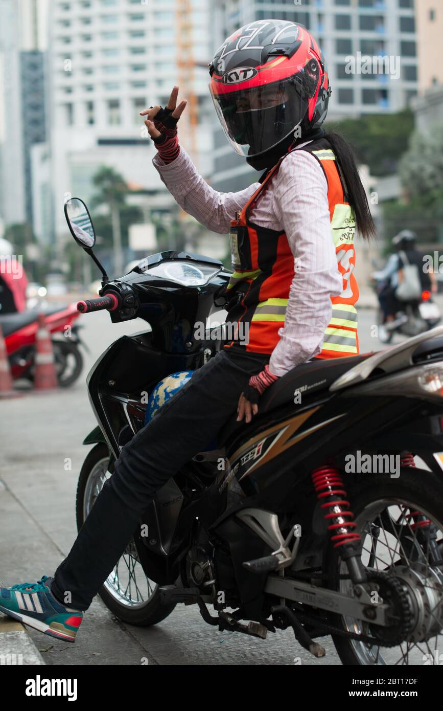 Female motor scooter rider hi-res stock photography and images - Alamy
