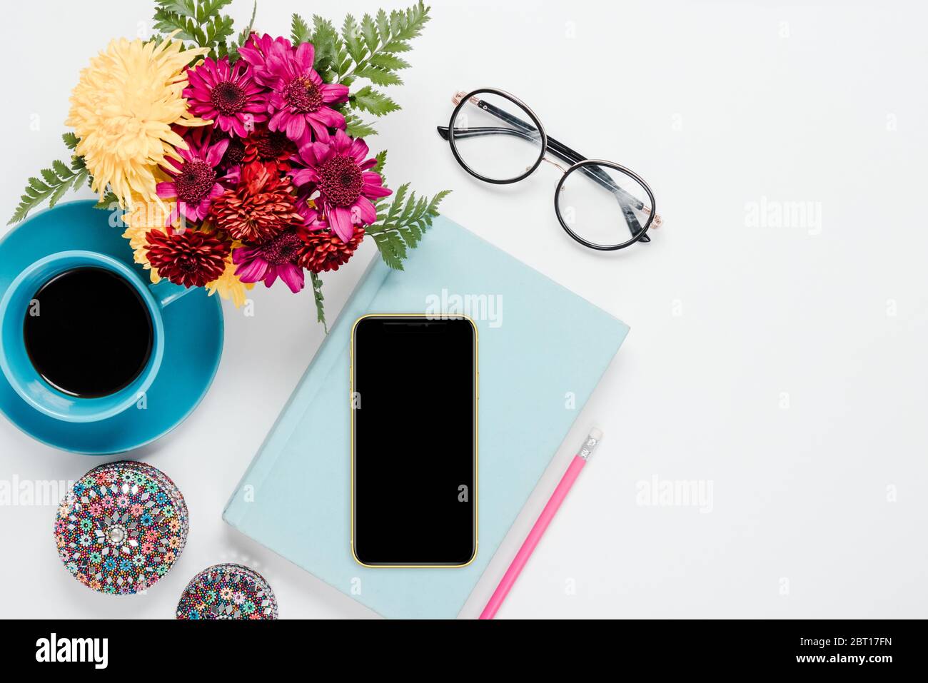 Colorful office cellphone layout with desk accessories Stock Photo - Alamy