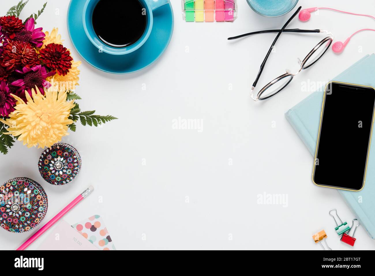 Colorful office cellphone layout with desk accessories Stock Photo - Alamy