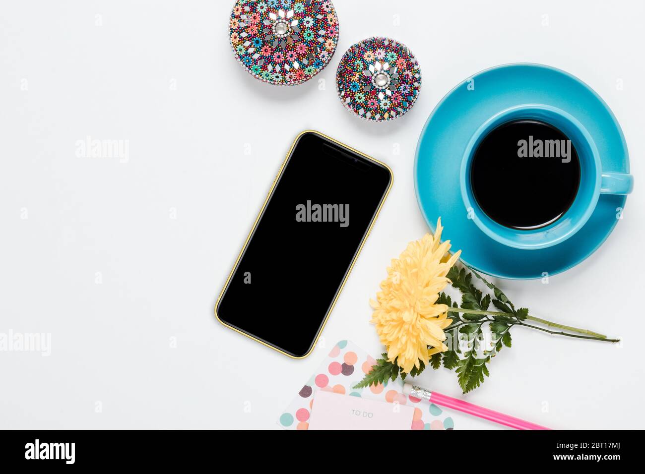 Colorful office cellphone layout with desk accessories Stock Photo - Alamy