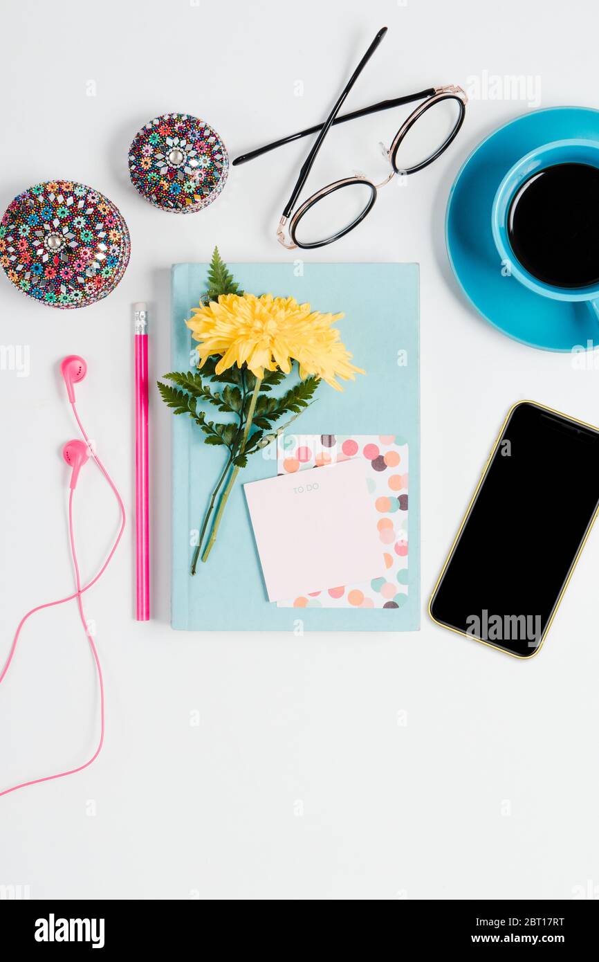 Colorful office cellphone layout with desk accessories Stock Photo - Alamy