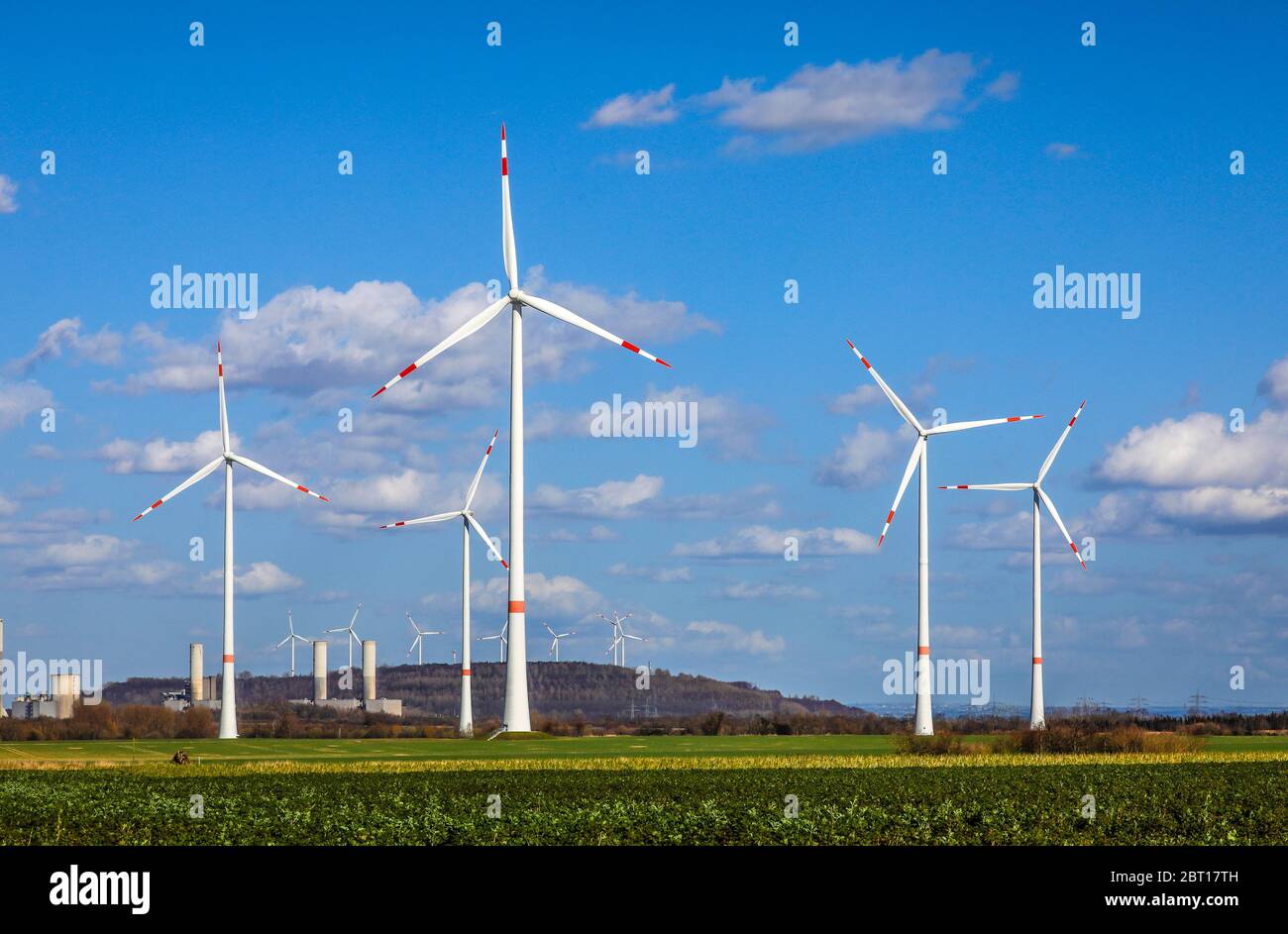 Bedburg, North Rhine-Westphalia, Germany - Wind turbines against a blue ...