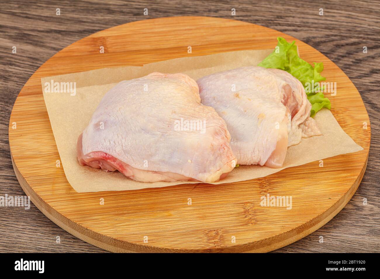 Raw chicken hip ready for cooking Stock Photo - Alamy