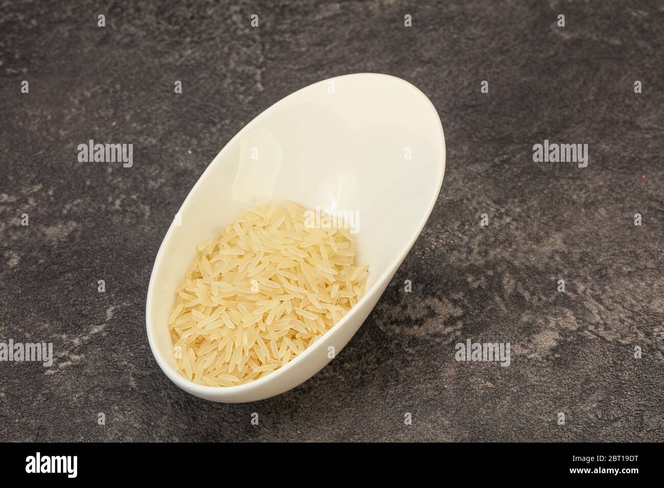 Raw Indian basmati rice in the bowl Stock Photo - Alamy