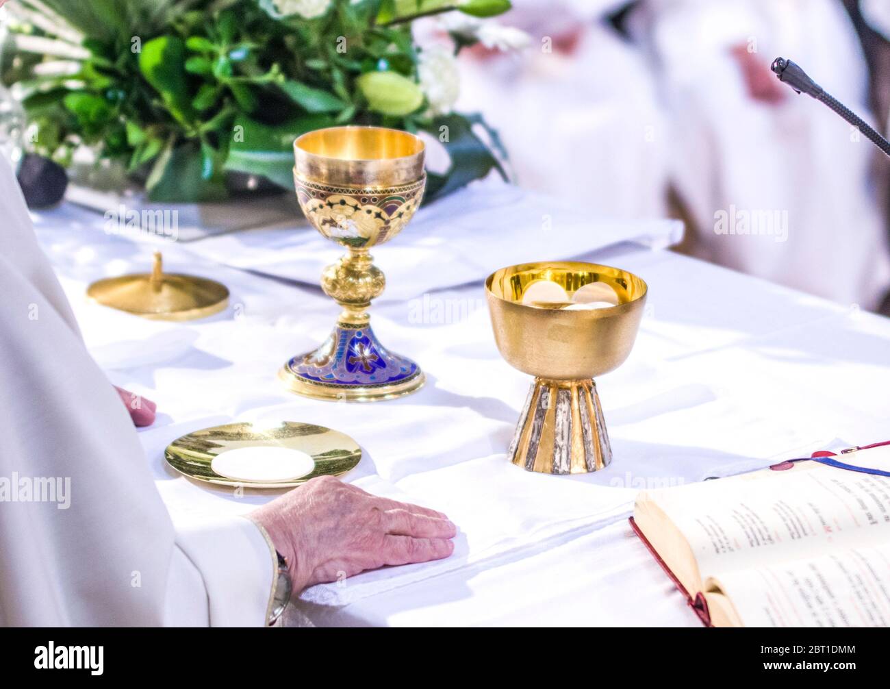 altar with consecrated host that becomes the body of jesus christ and ...