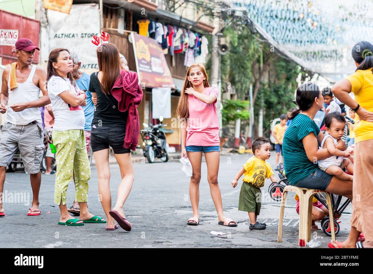 Candid shots of families and children going about their daily business ...