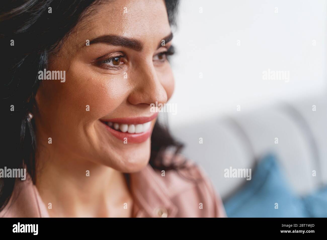Attractive lady with charming smile expressing positive emotions Stock ...