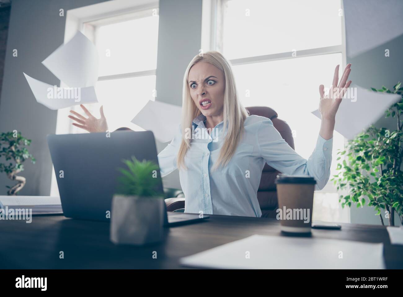 Photo of beautiful outraged business lady look notebook table arms ...