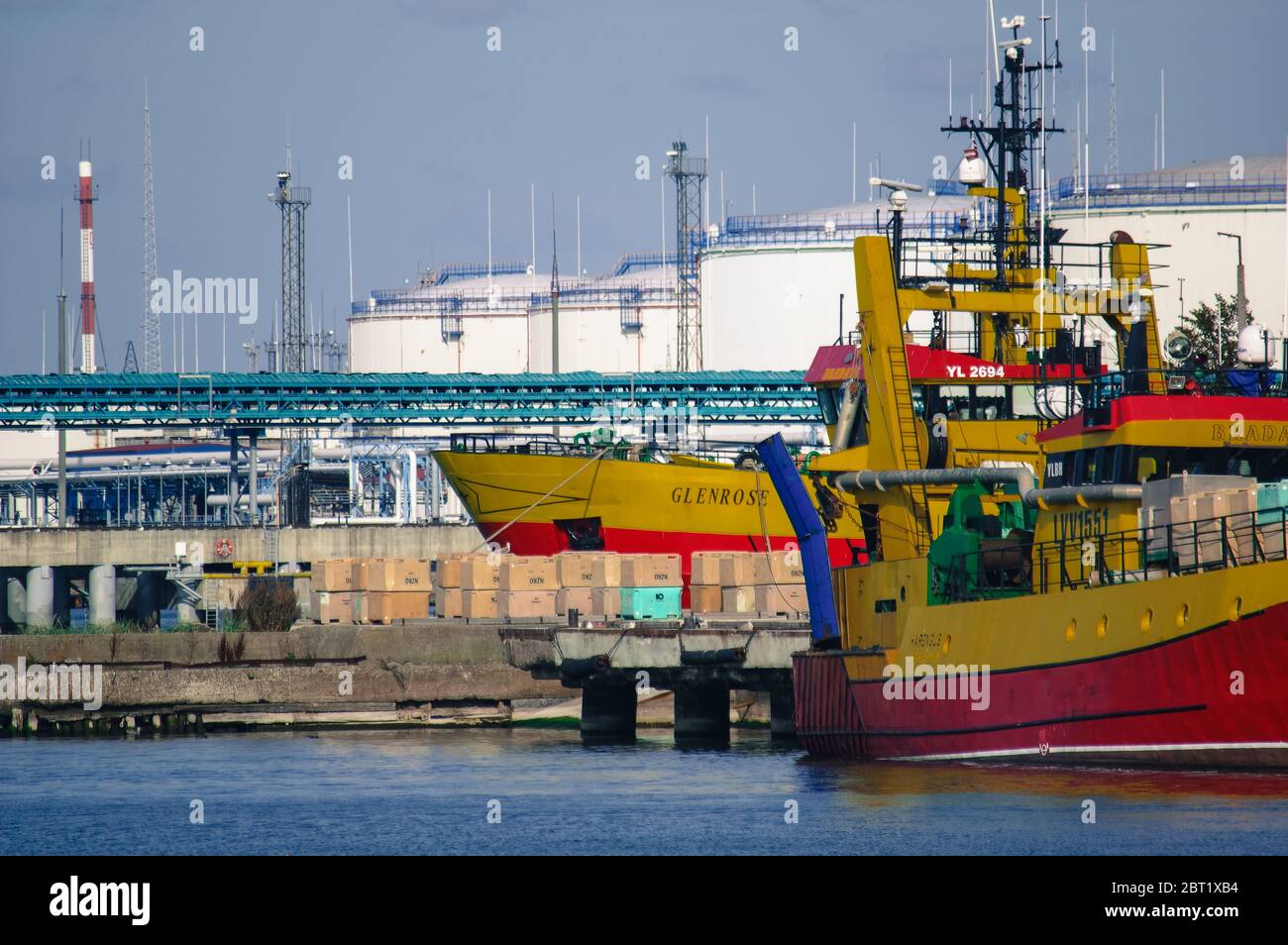 Modern steel fishing ships docked in port Stock Photo - Alamy