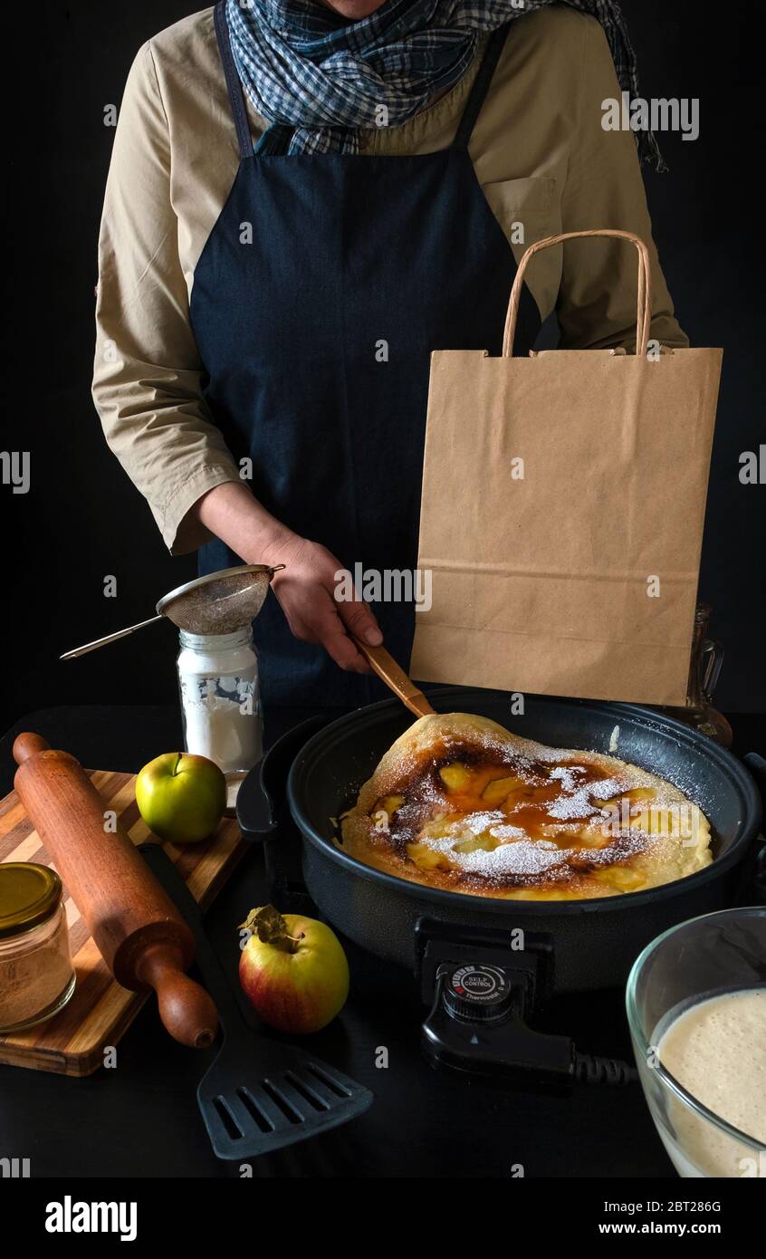 Chif cooking food take away, concept delivery service. Traditional ...