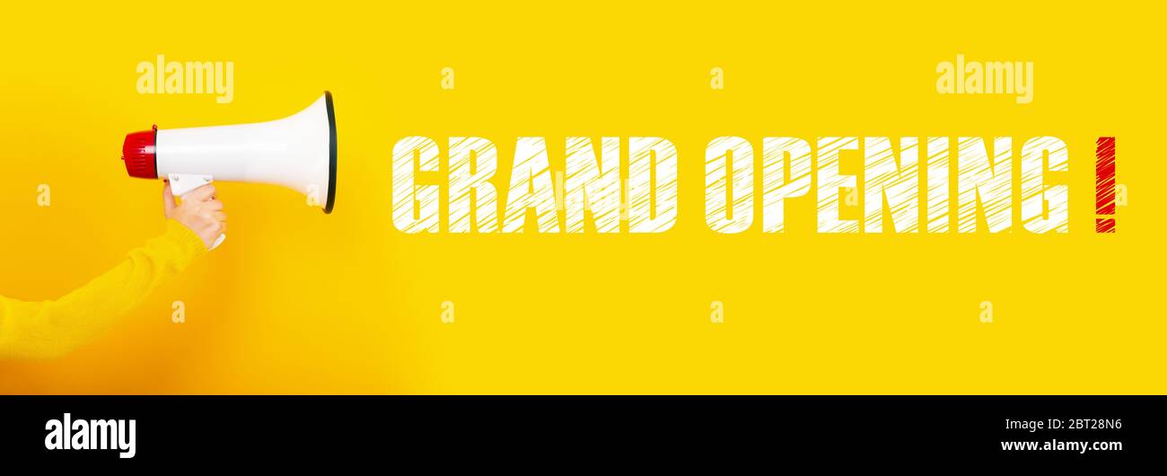 megaphone with inscription grand opening, panoramic image, attention ... megaphone with inscription grand opening, panoramic image, attention ...