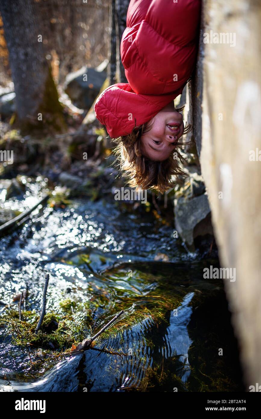 Hanging upside down hi-res stock photography and images - Alamy