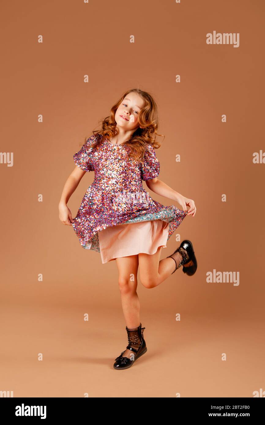 beautiful girl in a party dress Stock Photo - Alamy