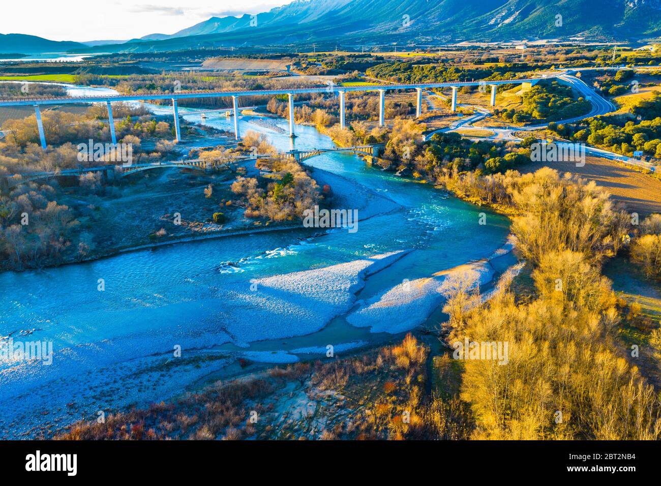 Riverbed and bridge in a natural landscape Stock Photo - Alamy